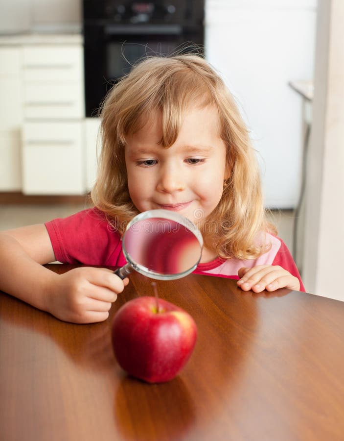 Child are Considering a Magnifying Glass Apple Stock Photo - Image of ...
