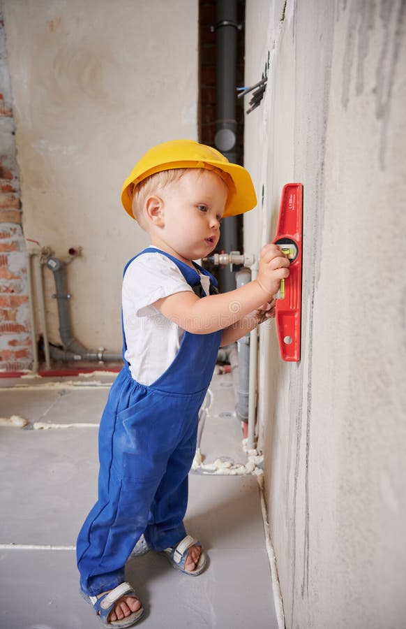 Child Construction Worker Holding Mesh Fiberglass Rebar. Stock Photo ...