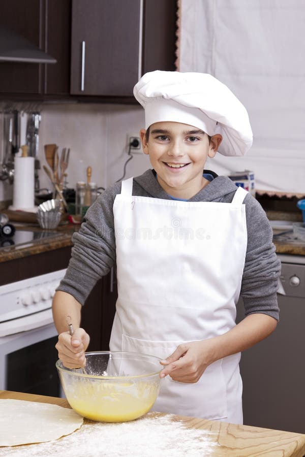 Child cooking stock image. Image of happiness, family - 66529063