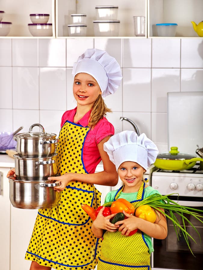 Child cooking at kitchen. stock image. Image of indoors - 69325253