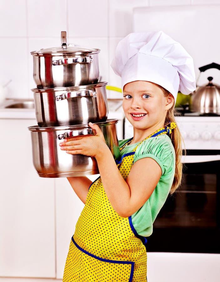 Child cooking at kitchen. stock photo. Image of cooker - 34070588