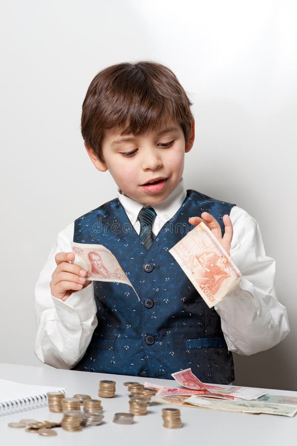 Child counting money stock image. Image of indoor, portrait - 17639269