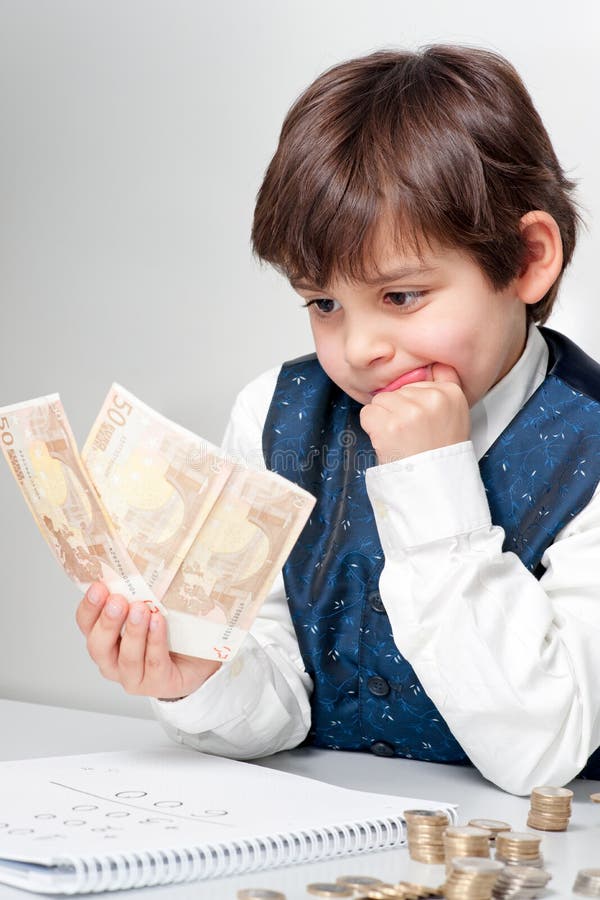 Child counting money stock image. Image of indoor, portrait - 17639269