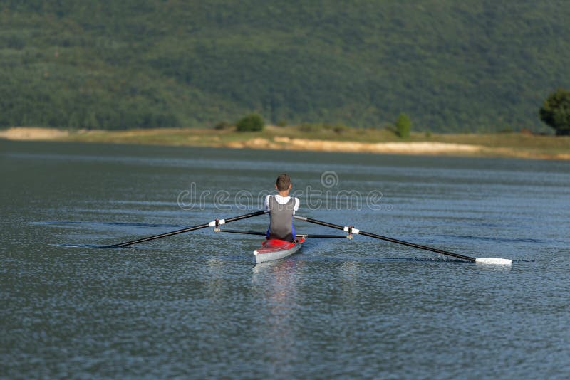 Child in the Course of Rowing on Single Stock Image - Image of rowing ...
