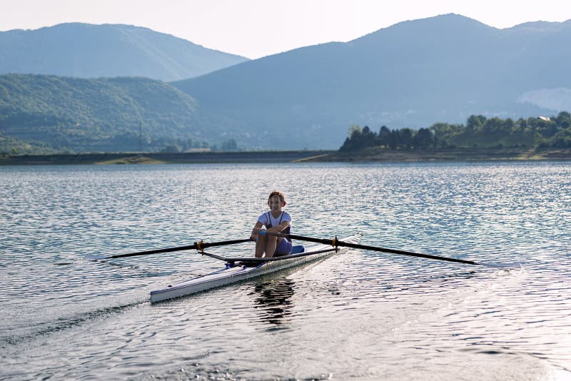 Child in the Course of Rowing on Single Stock Photo - Image of outdoors ...