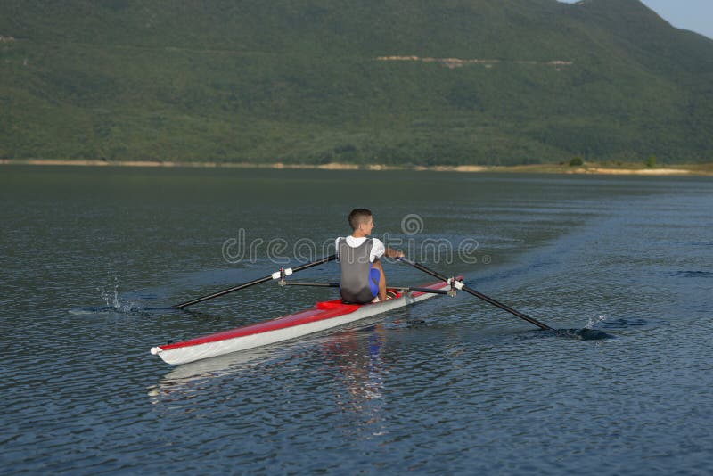 Child in the Course of Rowing on Single Stock Image - Image of river ...
