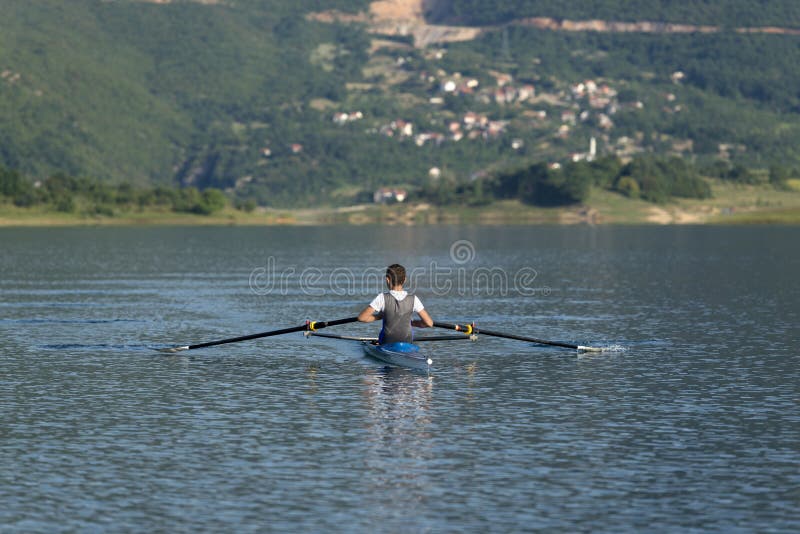 Child in the Course of Rowing on Single Stock Image - Image of physical ...