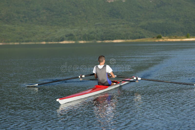Child in the Course of Rowing on Single Stock Photo - Image of ...