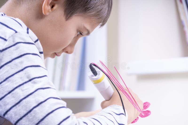 Boy Creating New 3d Object with 3d Pen. Learning and Entertainment at ...