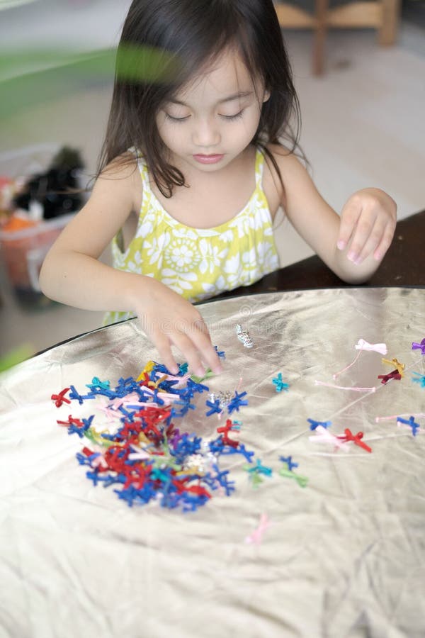 Child Creative Project, Arranging Ribbons on the Table. Creative ...
