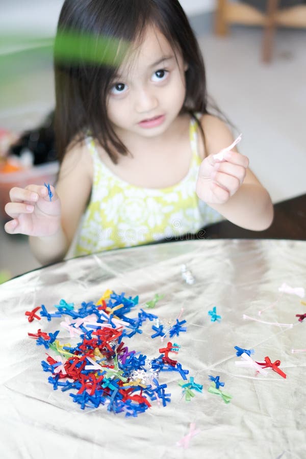 Child Creative Project, Arranging Ribbons on the Table. Creative ...