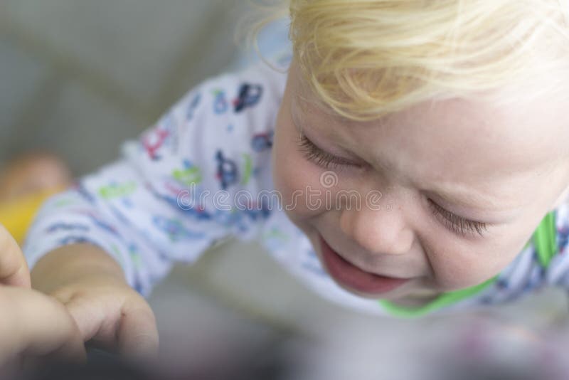 The Child is Crying from Frustration, Pain or a Bad Mood Stock Image ...