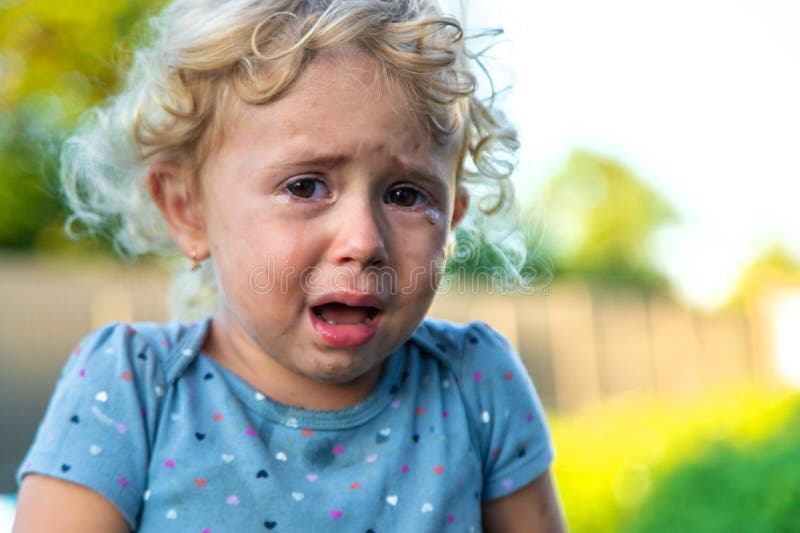 A Child is Crying on the Street. Selective Focus Stock Photo - Image of ...