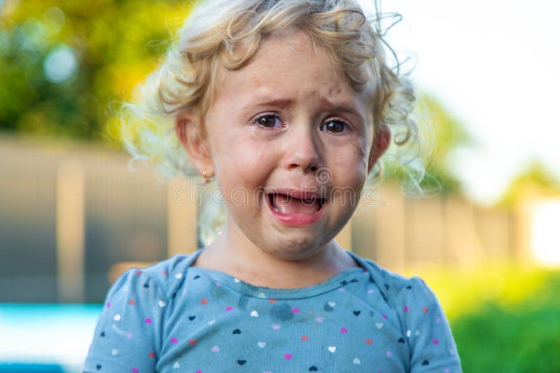 A Child is Crying on the Street. Selective Focus Stock Image - Image of ...