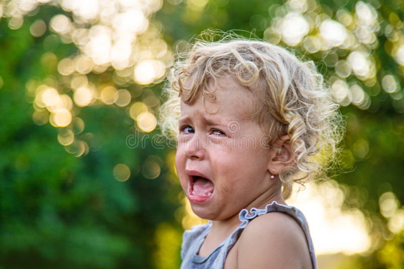 A Child is Crying on the Street. Selective Focus Stock Image - Image of ...