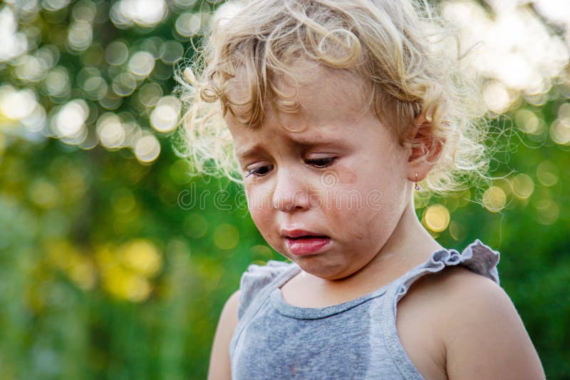 A Child is Crying on the Street. Selective Focus Stock Photo - Image of ...