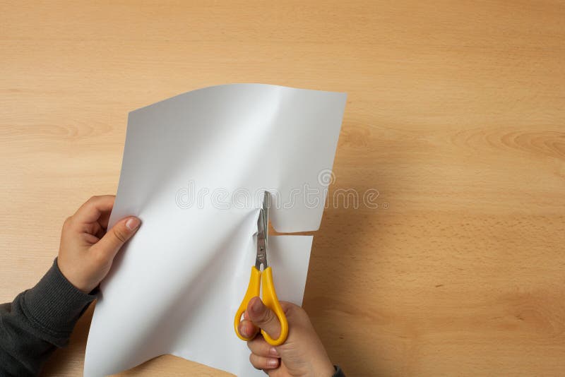 Child Cuts a Paper with a Scissors. Stock Image - Image of desk, game ...
