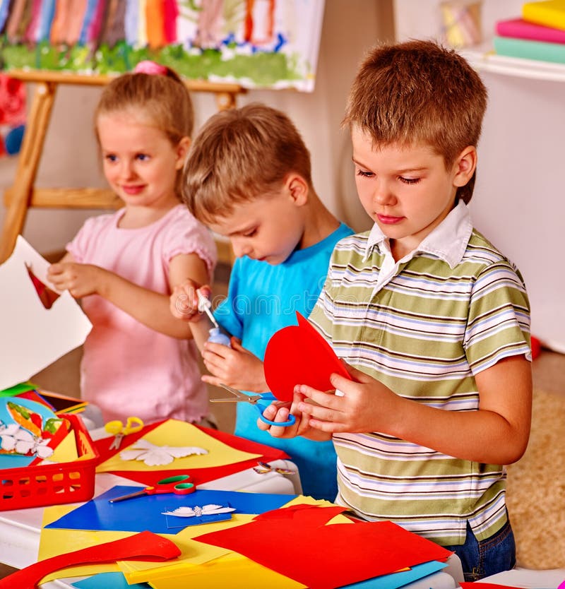 Child Cutting Out Scissors Paper Stock Photo - Image of indoor, nursery ...