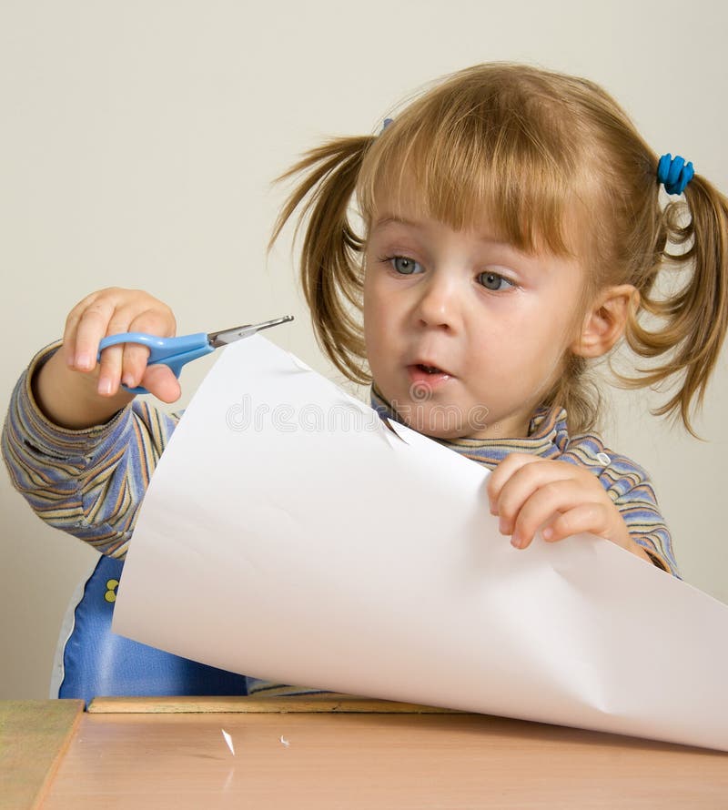 Child cutting paper stock photo. Image of female, drawing - 1370840