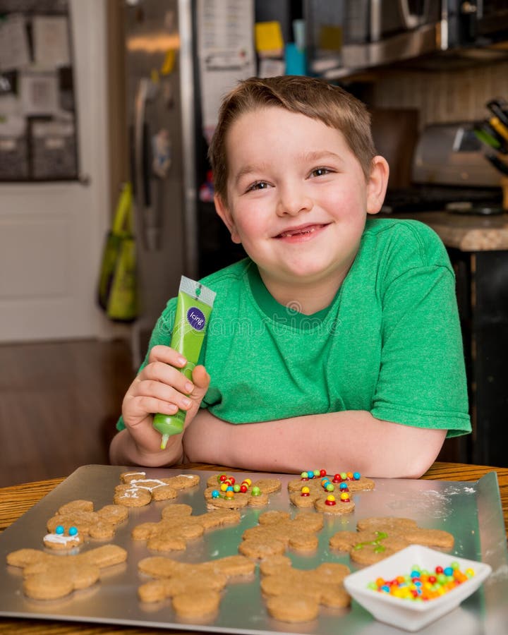 Child Decorating Ginger Bread Man Stock Photo - Image of homemade ...