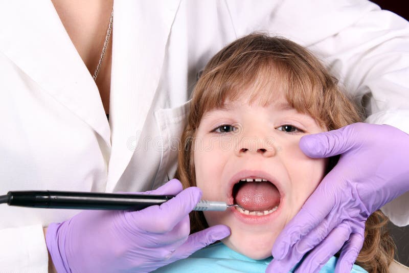 Child dental check stock photo. Image of helping, open - 27939810