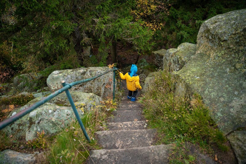 The Child Descends the Stone Steps on the Hiking Trail in the Mountains ...