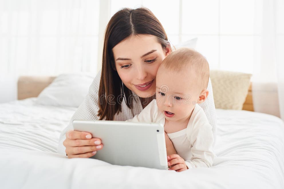 Child Development Using Modern Technology with Mom Stock Image - Image of girl, born: 265509727