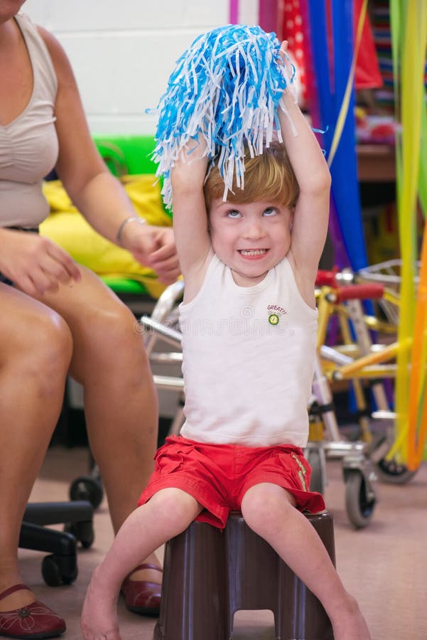 Happy Kids with Disabilities in Preschool Stock Photo - Image of center ...
