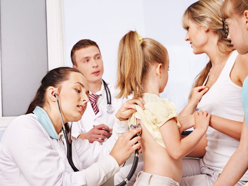 Child with doctor at exam. stock image. Image of health - 25349369