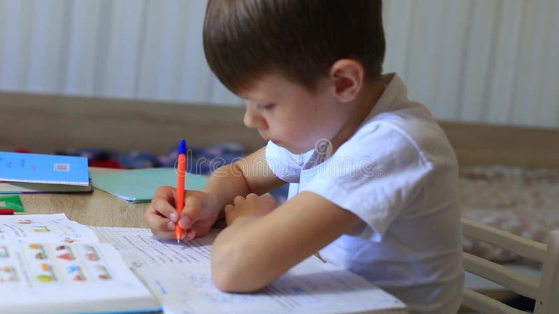 A Child Does Homework on Isolation. Homework Stock Footage - Video of ...