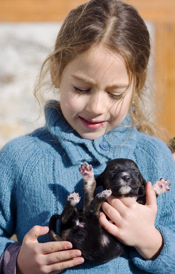 Child with dog stock photo. Image of little, hand, child - 13964284