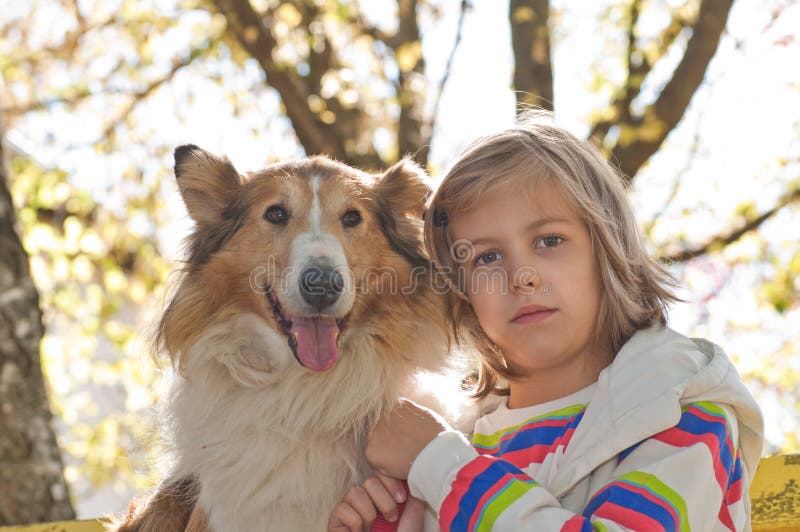 Child and dog stock photo. Image of fall, beauty, animals - 27542518