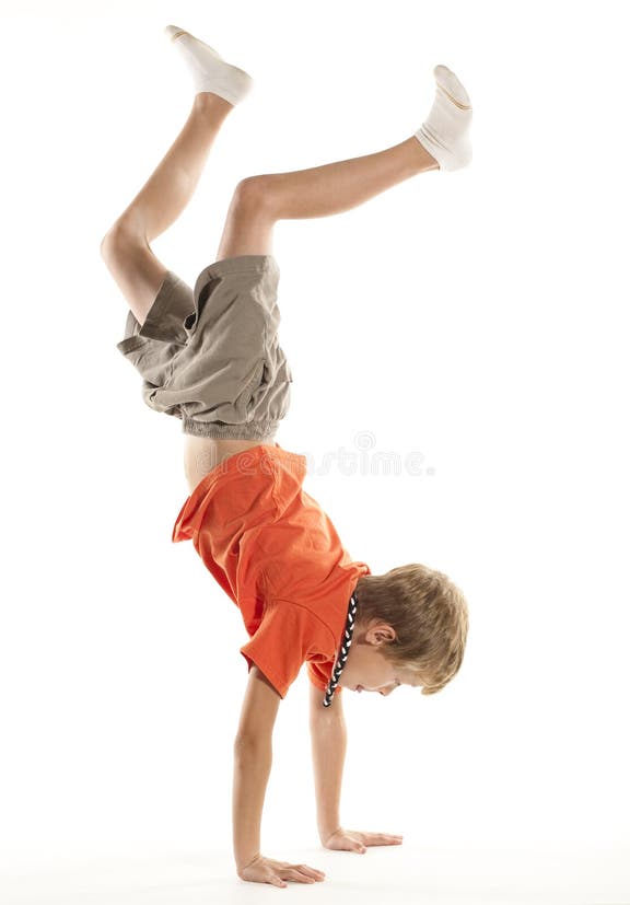 Child Doing a Hand Stand stock photo. Image of pose, playful - 21308092