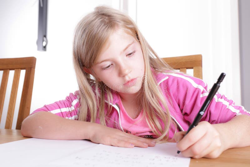 Child doing her homework stock image. Image of homework - 33704881