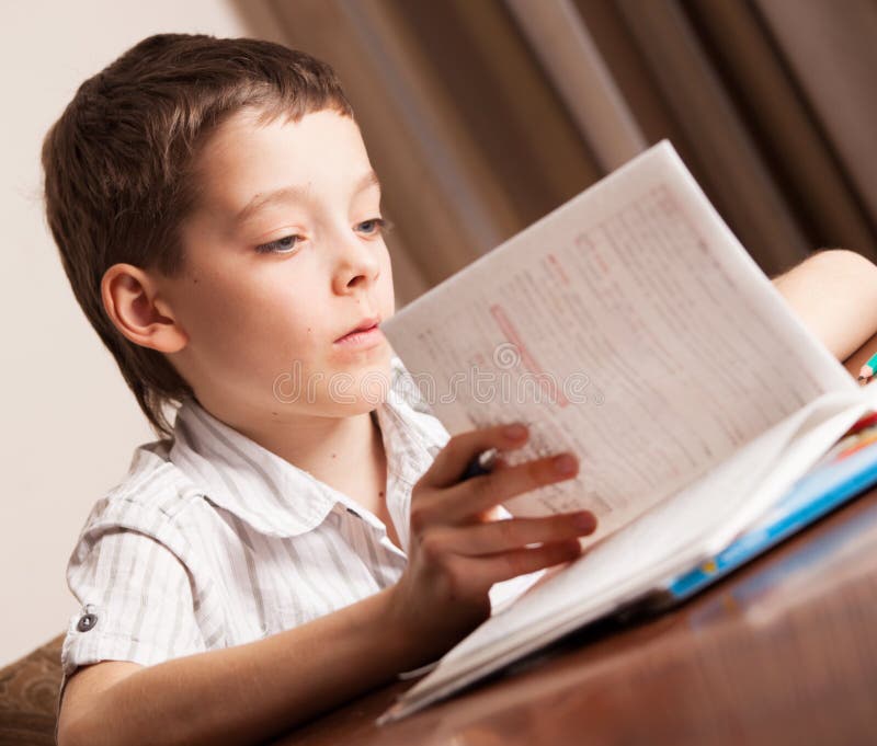 Sad child doing homework stock image. Image of homework - 47073169