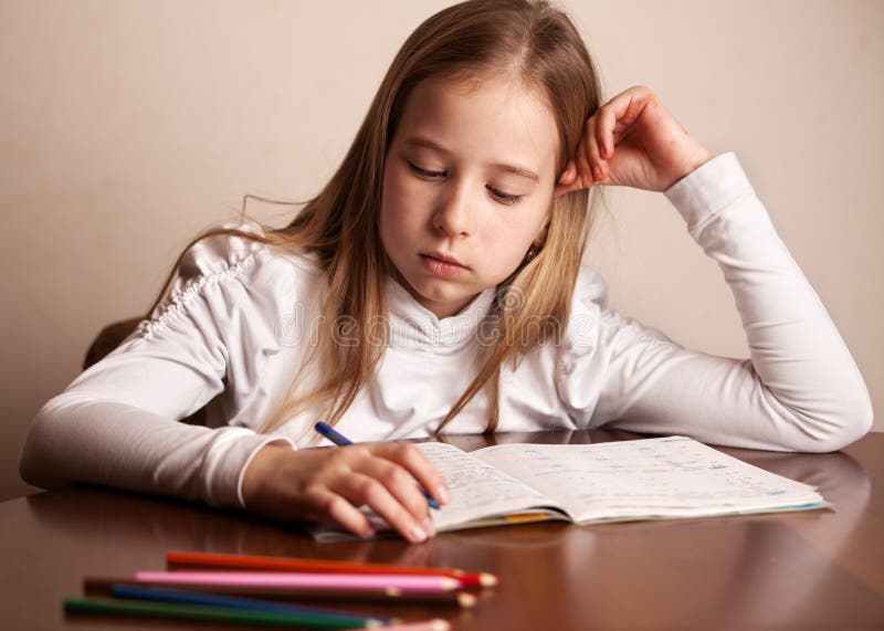 Girl doing homework stock image. Image of pencil, descent - 29996205