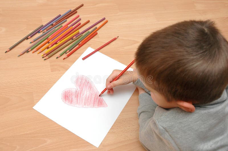 Child draw heart on paper stock photo. Image of descriptive - 12605954