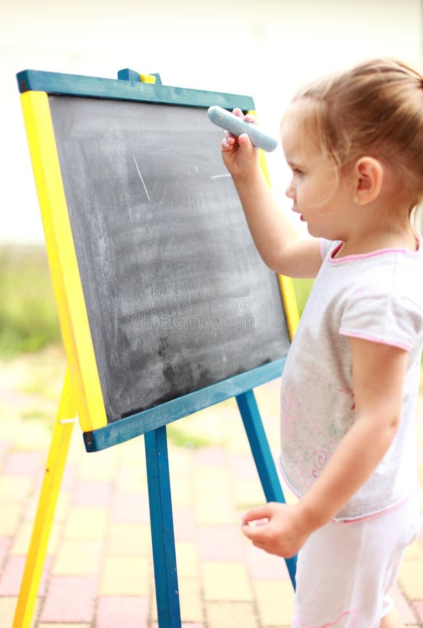 Child drawing stock image. Image of concentrate, busy - 12378919