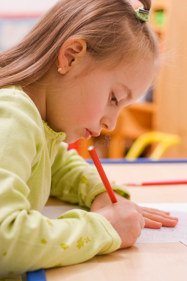 Child drawing stock image. Image of young, hand, crayon - 21674421
