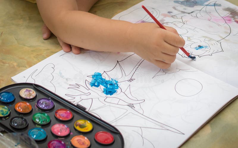 Child drawing with brush stock image. Image of creative - 171991435