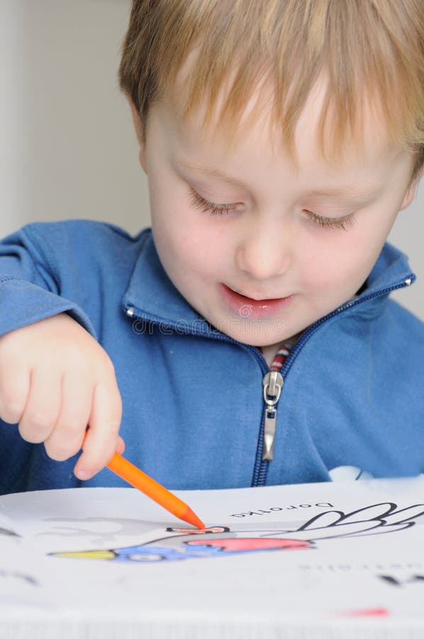 Child drawing stock image. Image of young, hand, crayon - 21674421