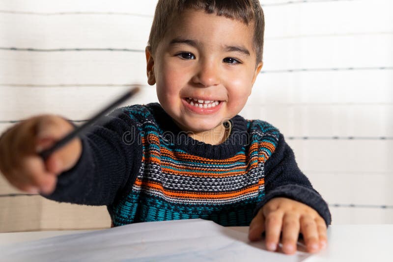 Child Drawing and Painting at Home. Learning and Playing at Home Stock ...