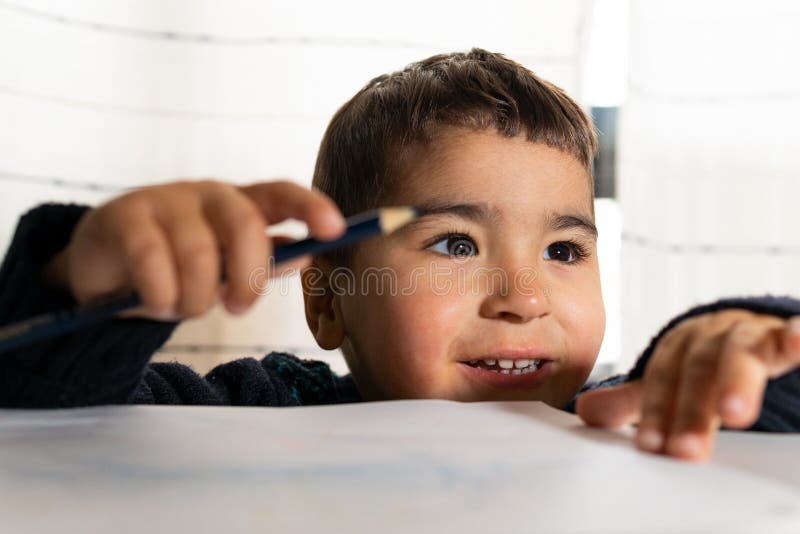 Child Drawing and Painting at Home. Learning and Playing at Home Stock ...