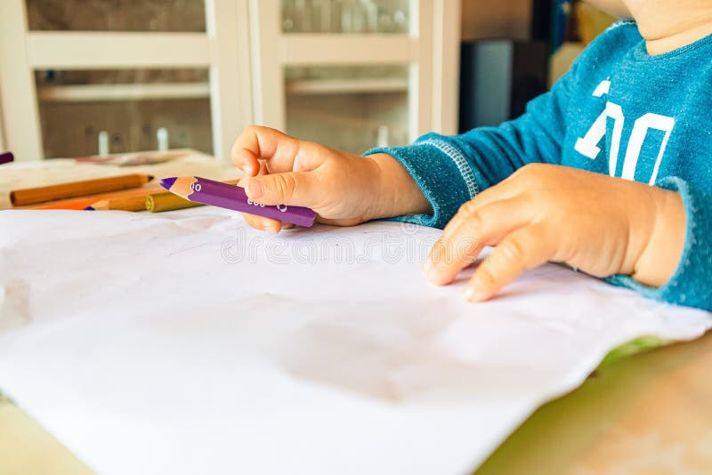 Child Drawing on the Paper with Colorful Pencils Stock Image - Image of ...