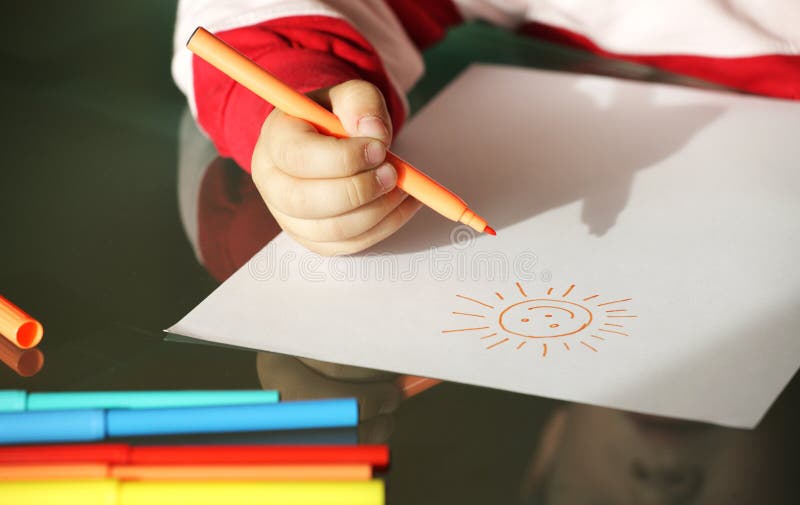 Child Drawing A Sun With Colorful Markers Stock Image - Image of ...