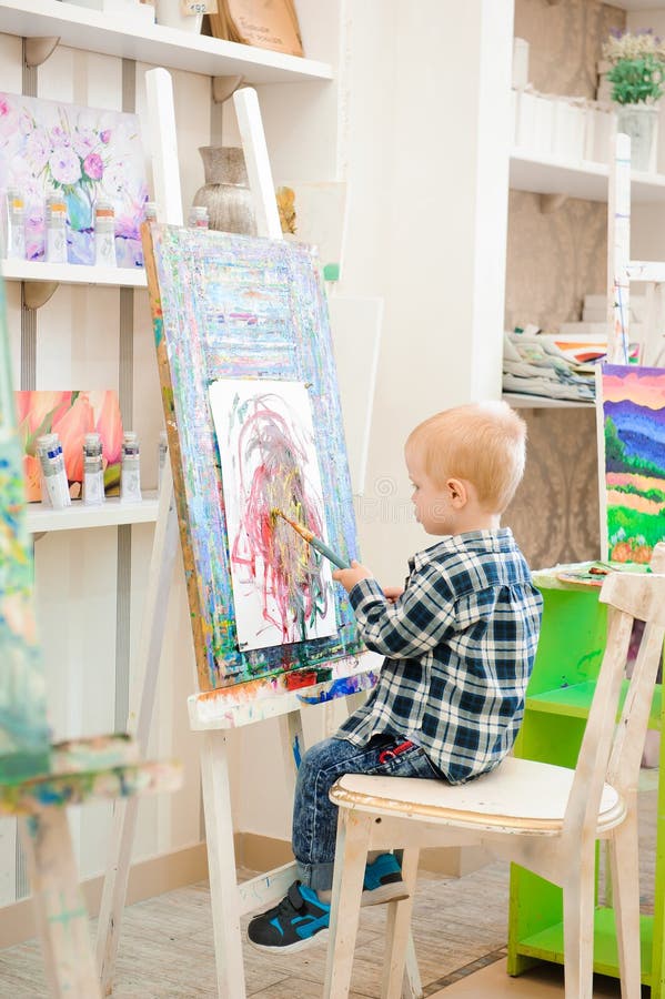 A Child Draws a Picture Paints on Art Lesson Stock Image - Image of ...