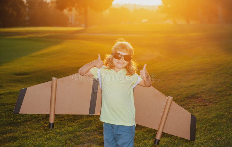 Child Dreams of Becoming a Rocket Pilot at Sunset. Imagination and ...