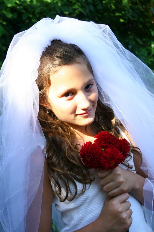Child dressing up as bride stock photo. Image of outdoors - 6542530