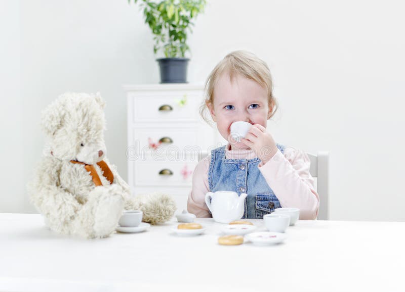 Child drink tea stock photo. Image of portrait, leisure - 24116696