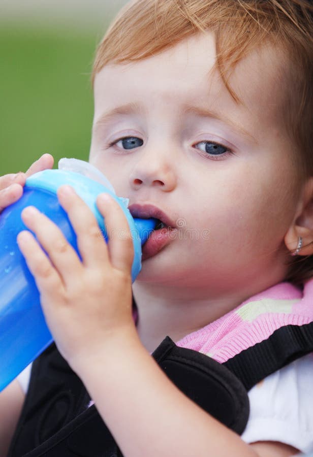 Child drinking stock image. Image of plastic, lifestyle - 7447795